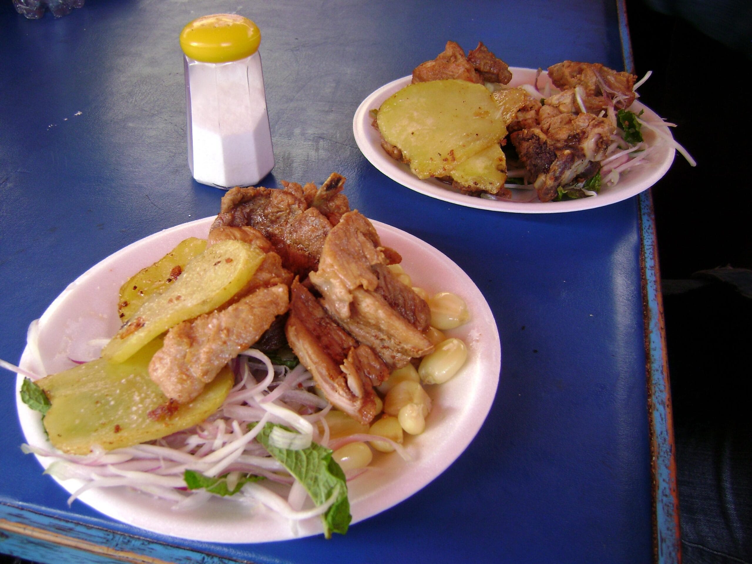 La Ricetta Peruviana del Frito de Chancho con Mote - Perù Asi!